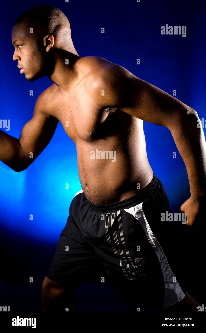 Man in great physical shape working out, toned muscles Stock Photo - Alamy