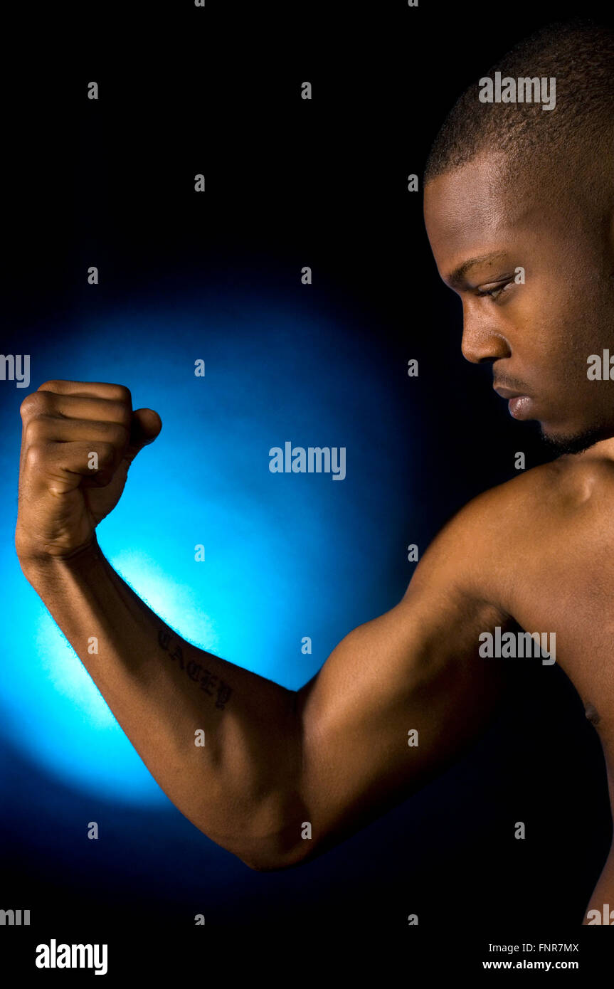 Man in great physical shape working out, toned muscles Stock Photo - Alamy