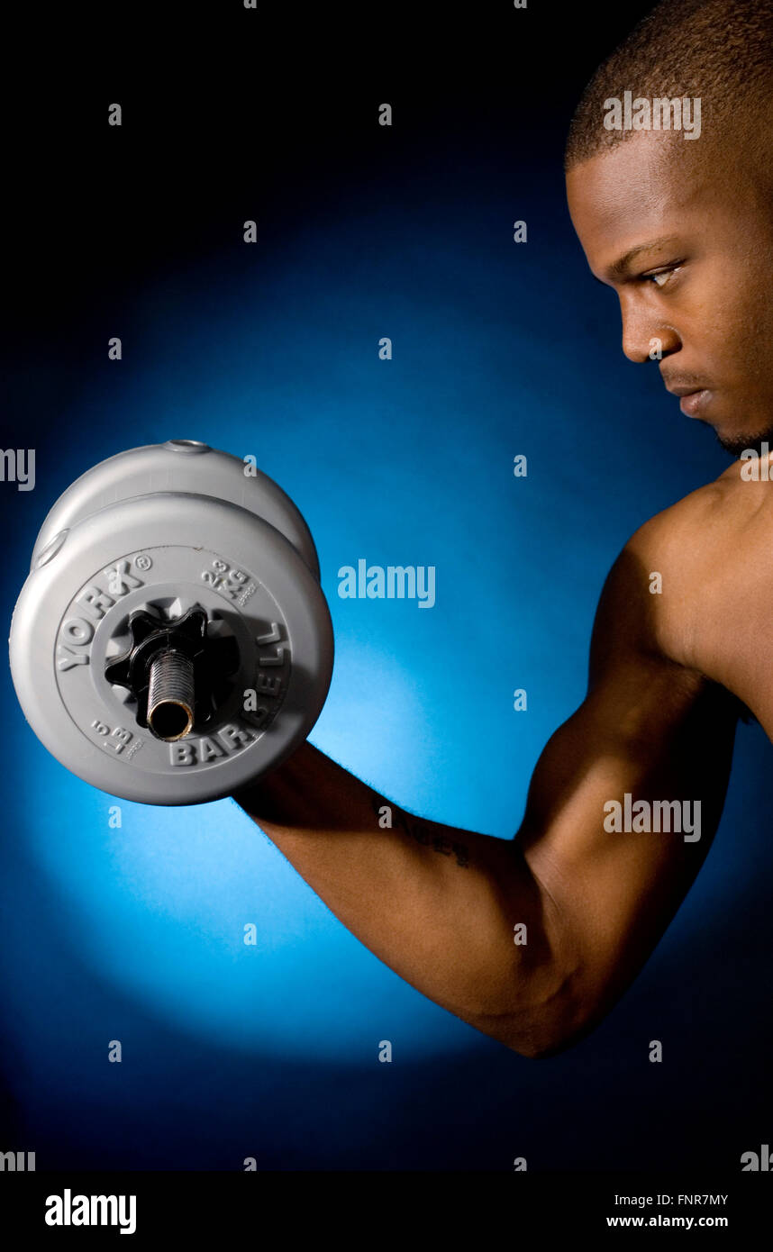 Man in great physical shape working out, toned muscles Stock Photo - Alamy