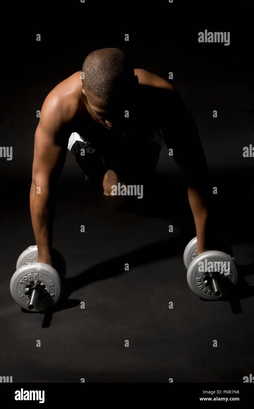 Man in great physical shape working out, toned muscles Stock Photo - Alamy