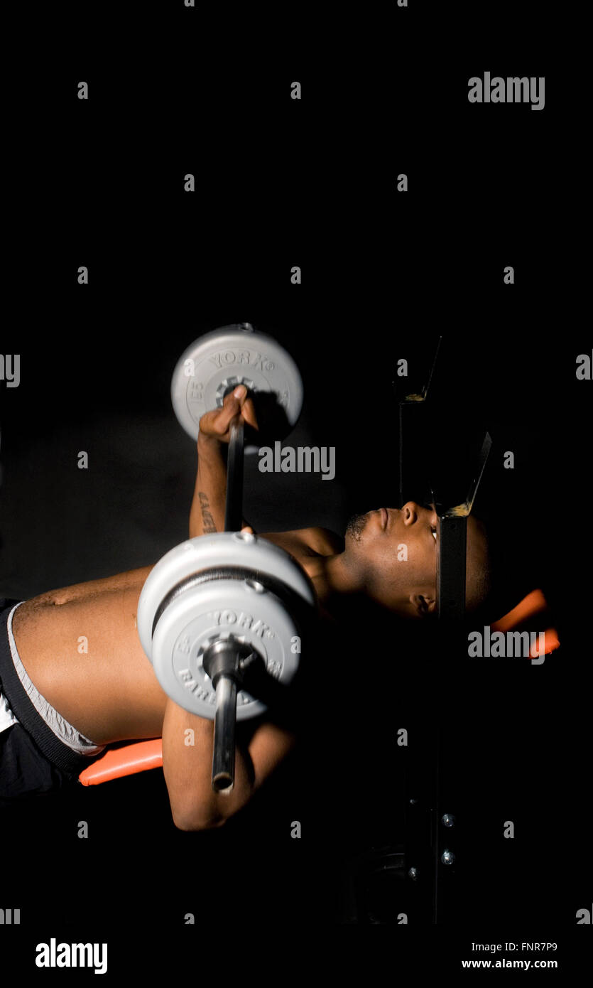 Man in great physical shape working out, toned muscles Stock Photo - Alamy