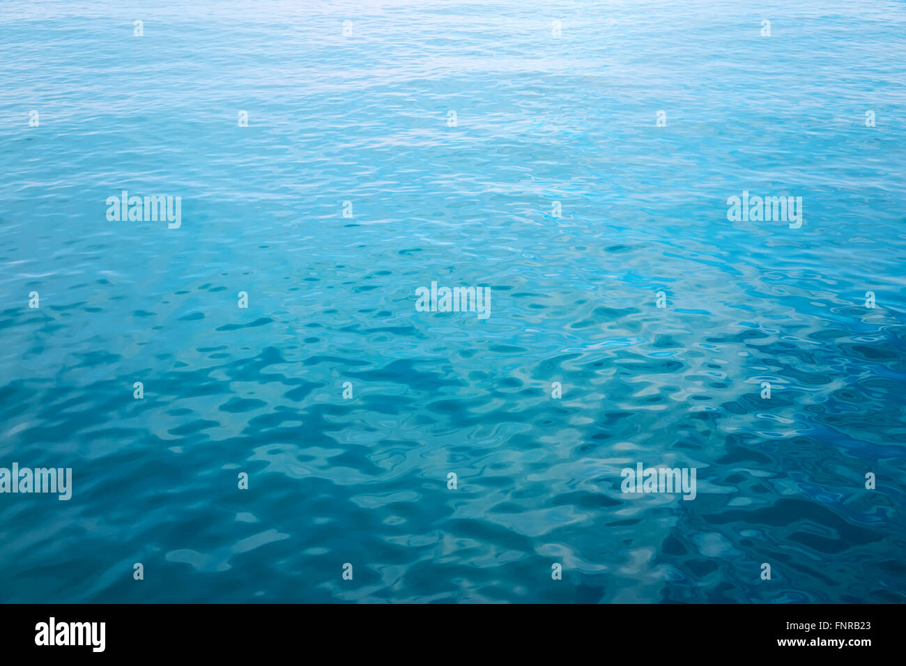 Blue water ocean with waves background Stock Photo - Alamy