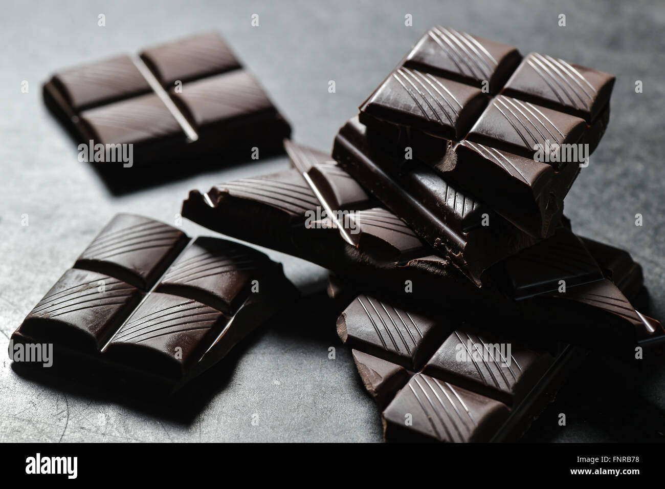 Broken chocolate bar parts hi-res stock photography and images - Alamy