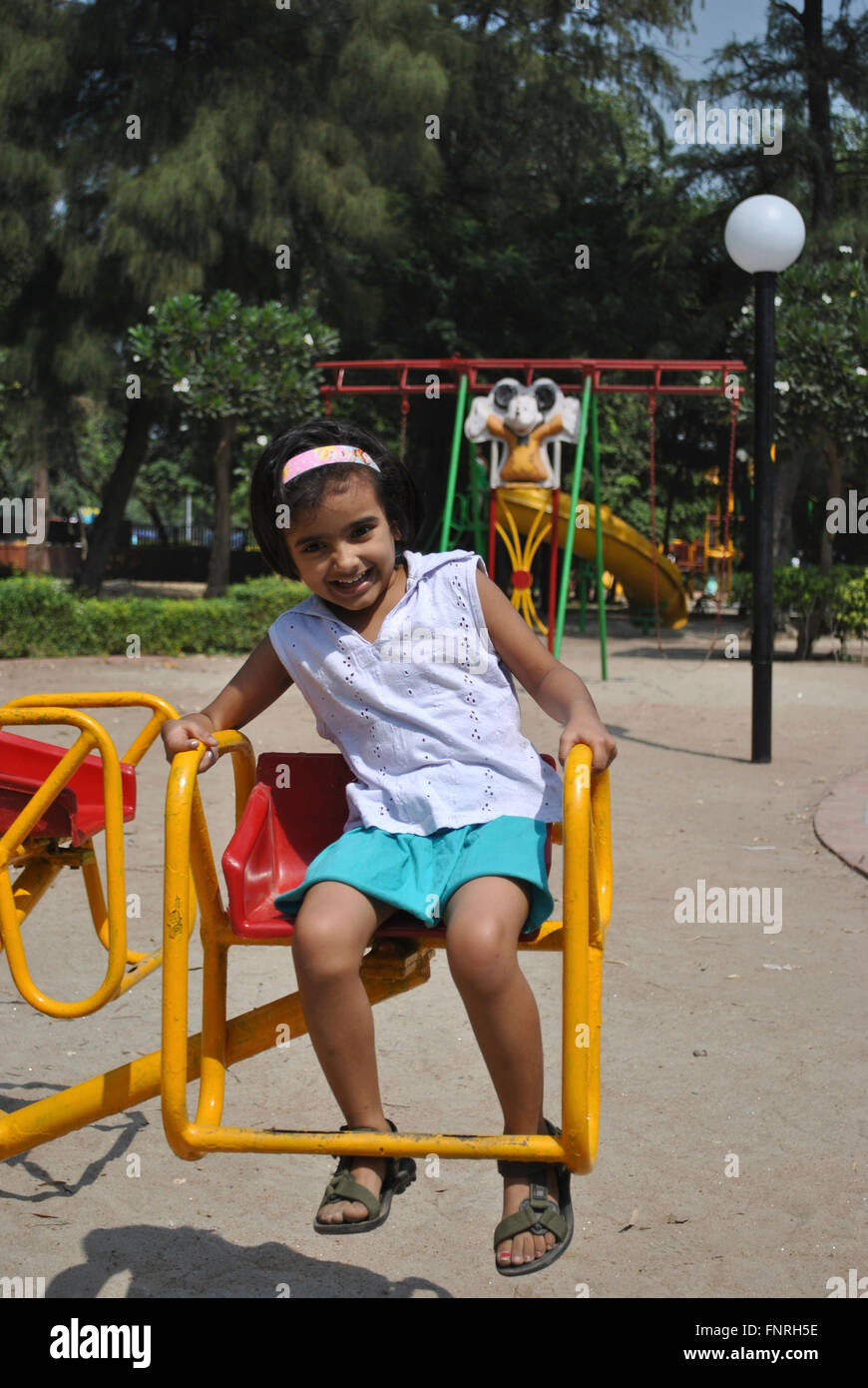 Indian Children Playing In The Playground