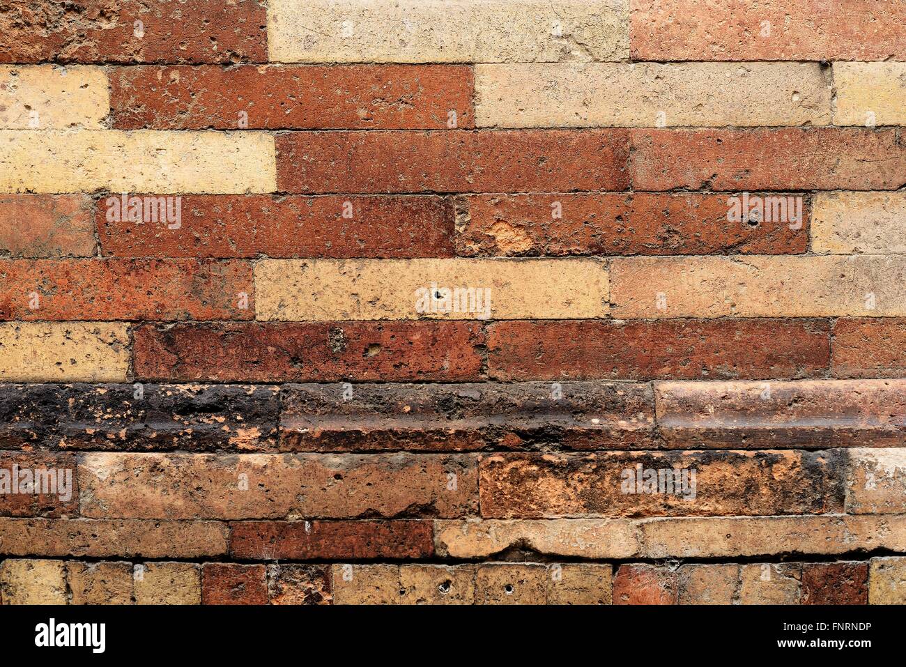 Brown and ocher bricks closeup Stock Photo - Alamy