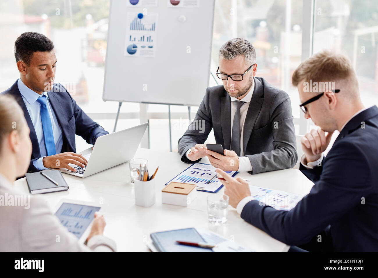 Group of business people busy with work Stock Photo - Alamy