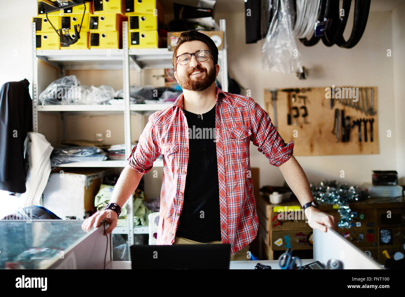 Salesman standing in workshop Stock Photo - Alamy