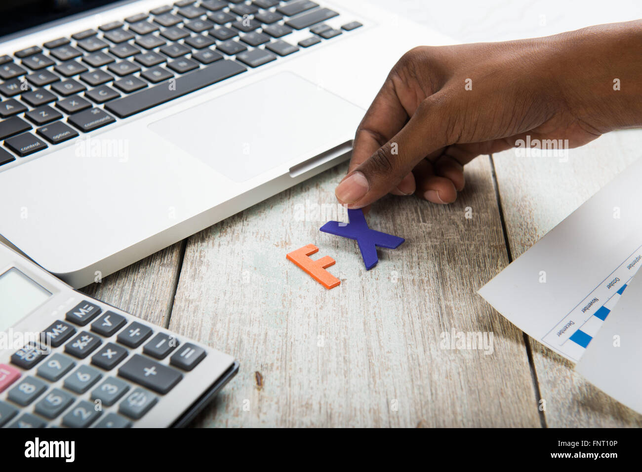 fx words with hands arrangement and financial concept Stock Photo - Alamy