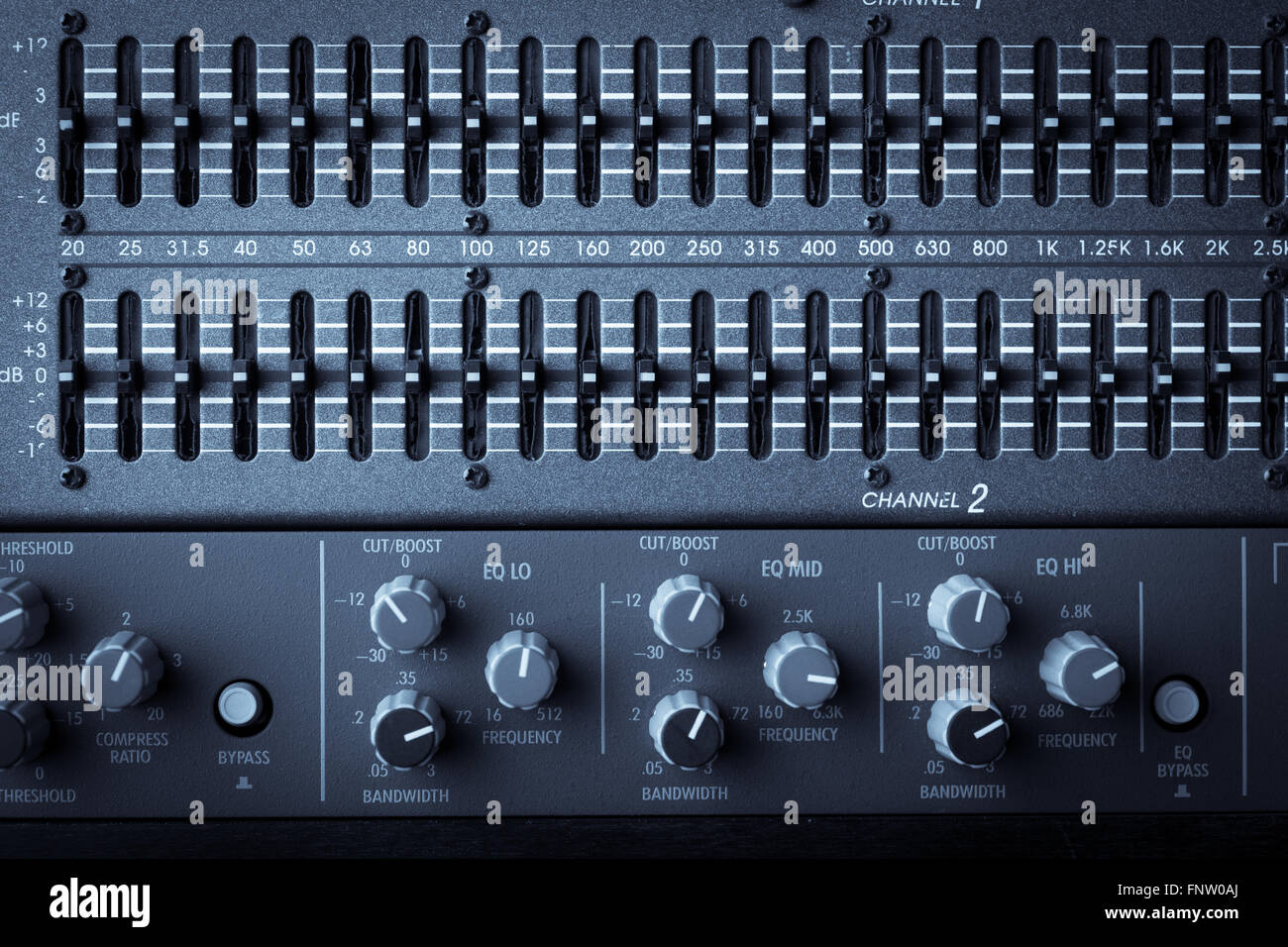 Color image of many buttons on a sound mixer in a recording studio ...