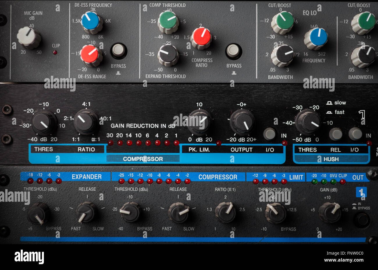 Color image of many buttons on a sound mixer in a recording studio ...