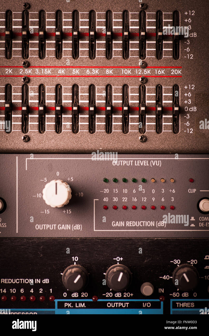 Color image of many buttons on a sound mixer in a recording studio ...