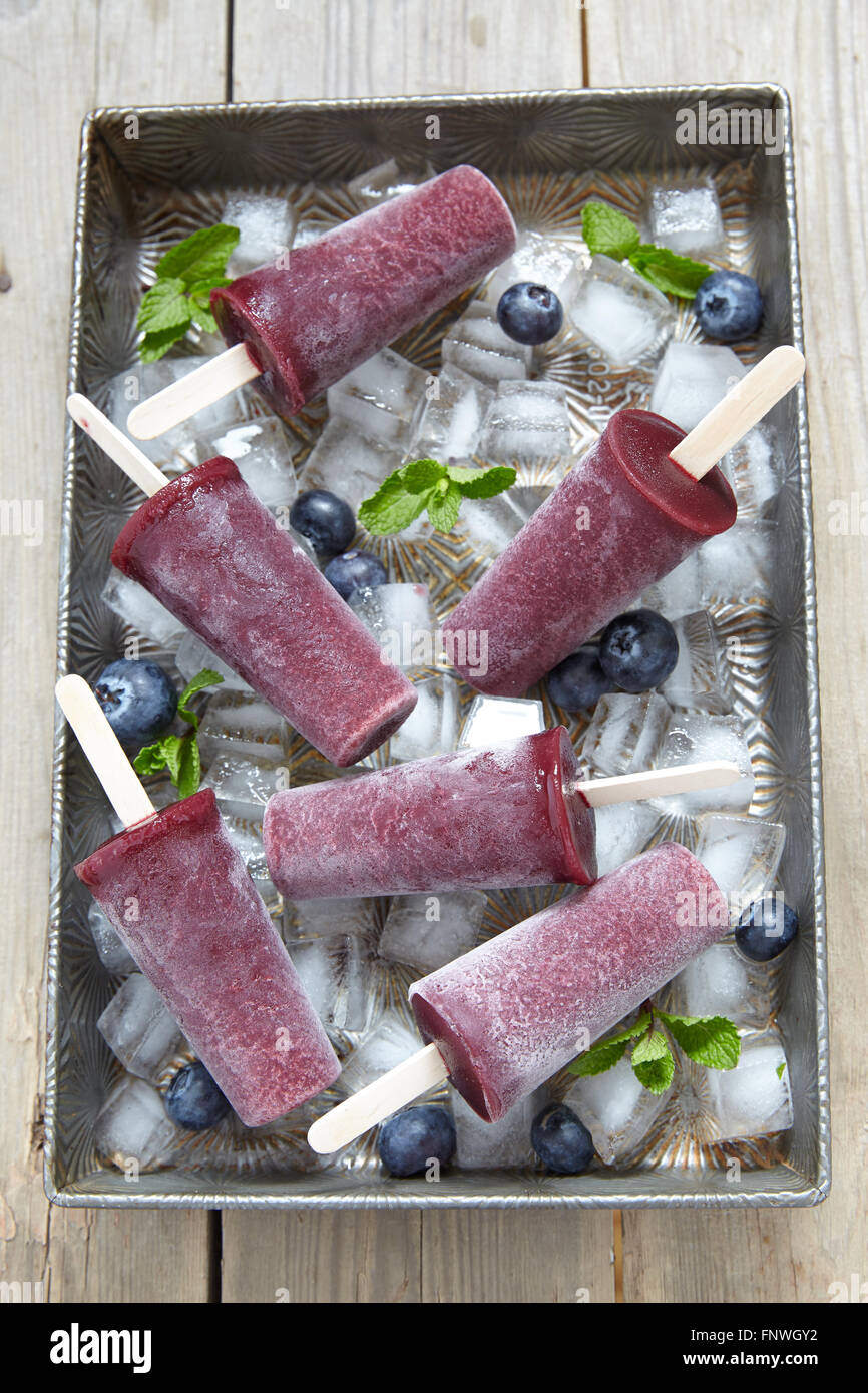 Blueberry ice cream popsicles Stock Photo - Alamy