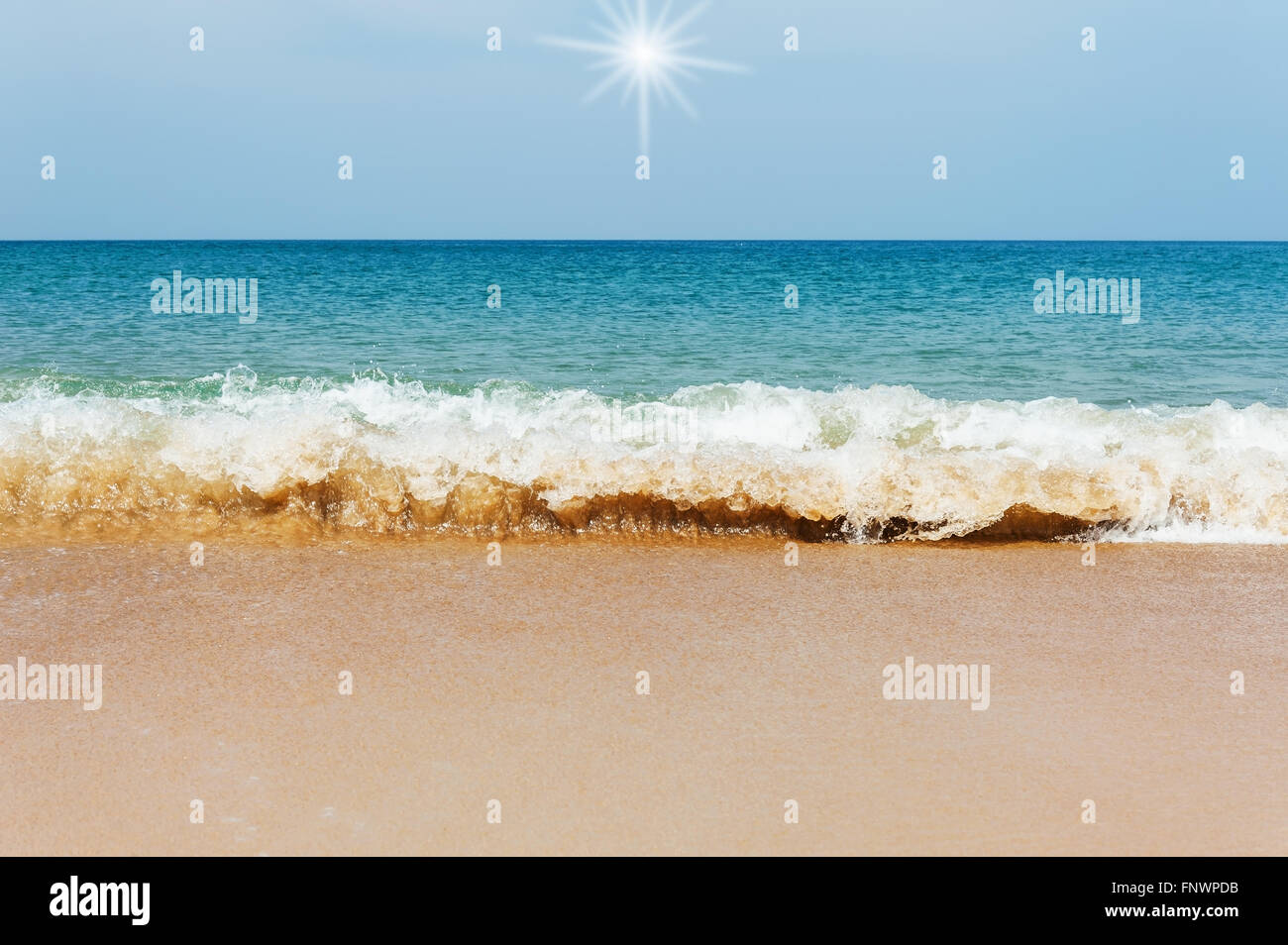 Blue sea with wave and white sand beach Stock Photo - Alamy
