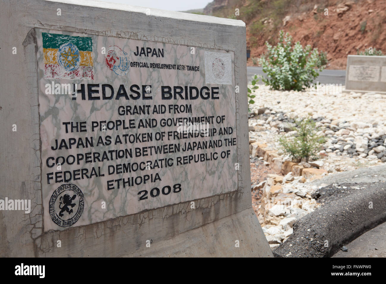 A plaque displaying information about the Hedase bridge across the Blue ...