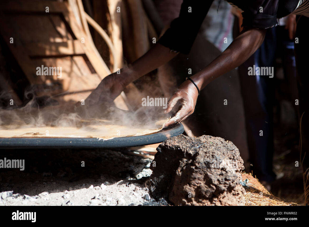 Woman making injera ethiopia hi-res stock photography and images - Alamy