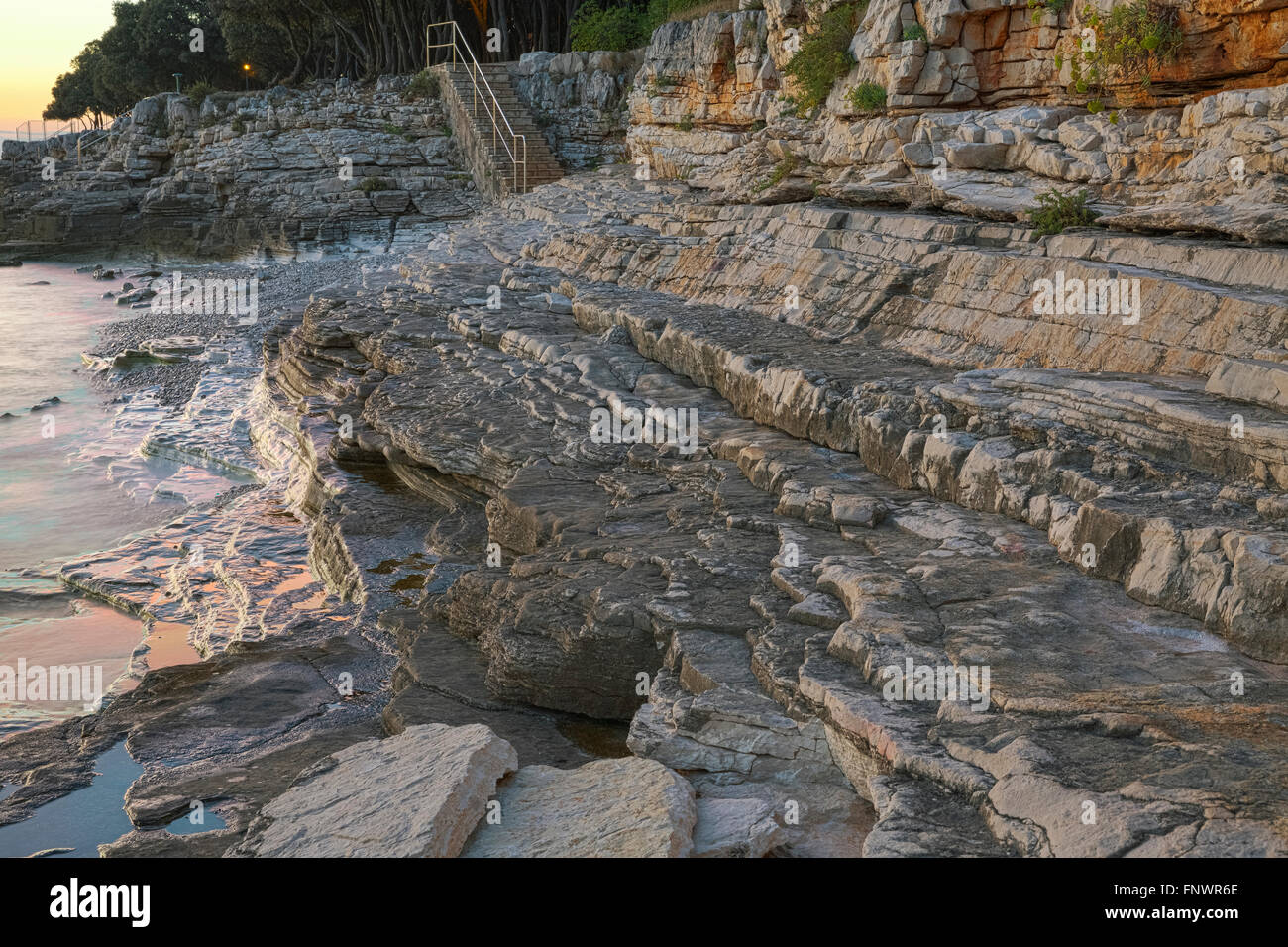Sunset rocky beach in Istria, Croatia. Solaris summer resort, Adriatic ...