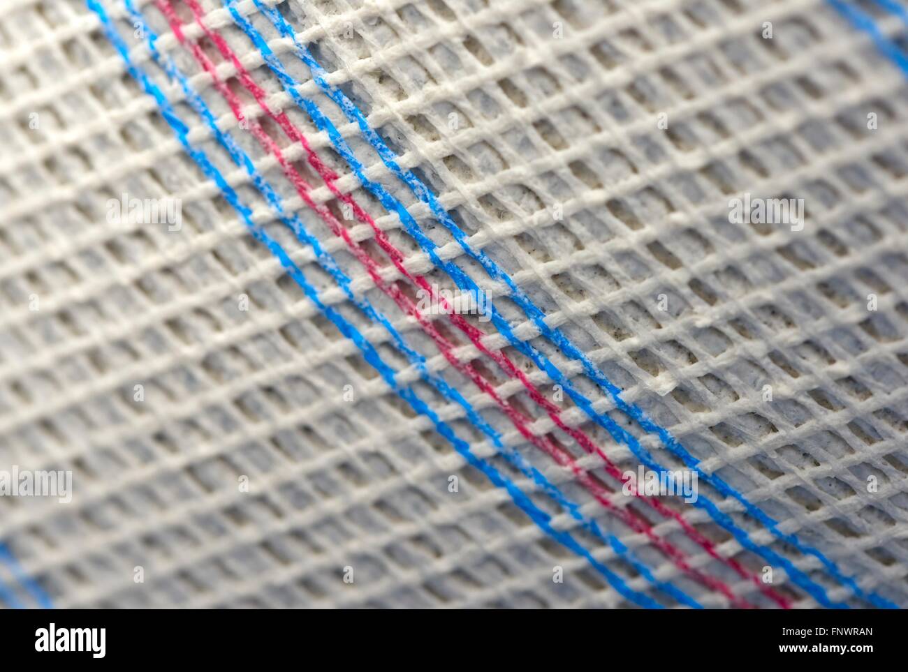 A close up shot of domestic carpet backing Stock Photo - Alamy
