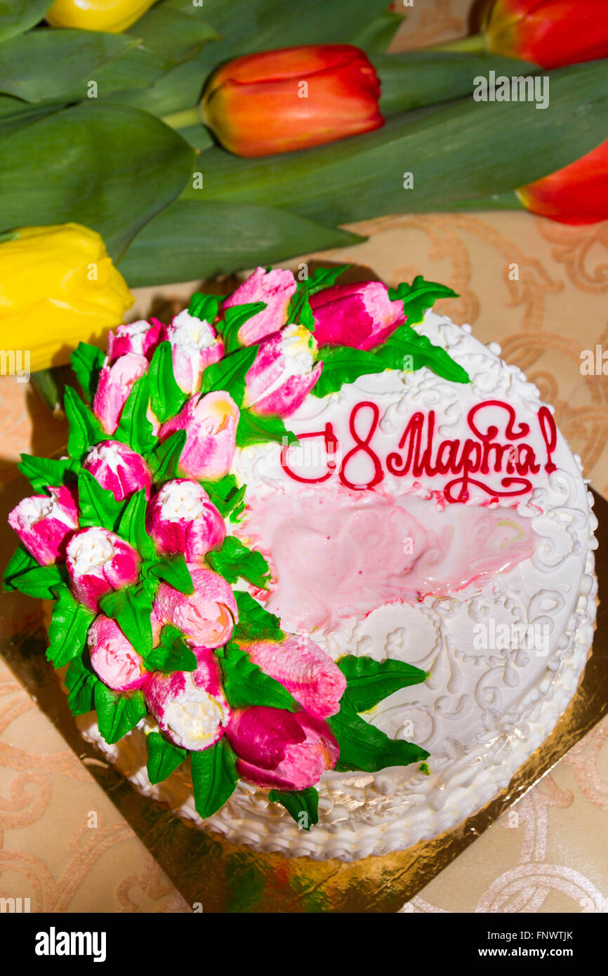 Beautiful cake for March 8 with tulips Stock Photo - Alamy