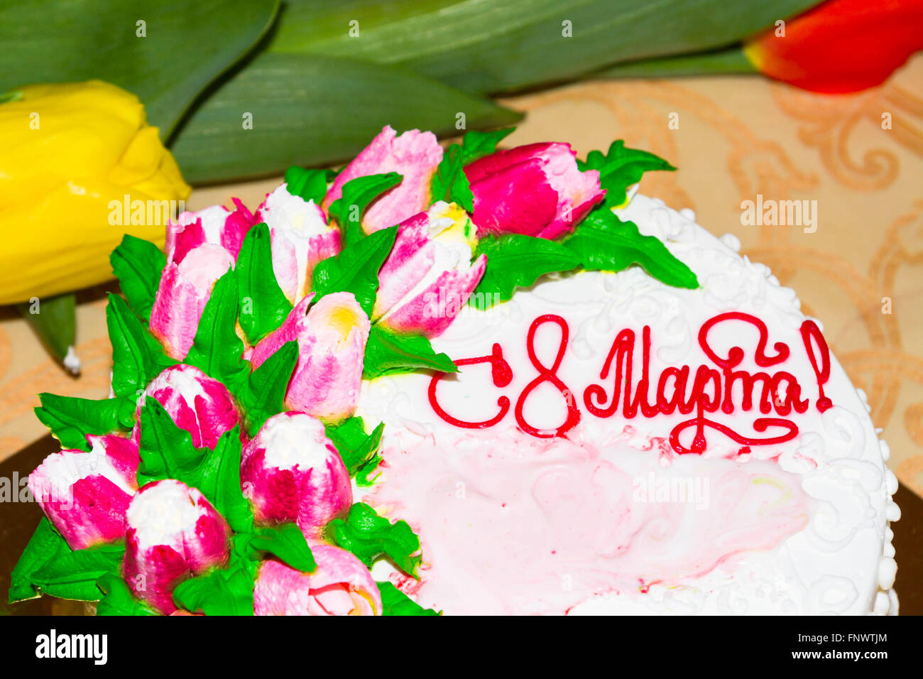 Beautiful cake for March 8 with tulips Stock Photo - Alamy