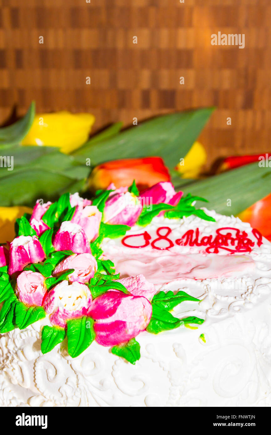 Beautiful cake for March 8 with tulips Stock Photo - Alamy