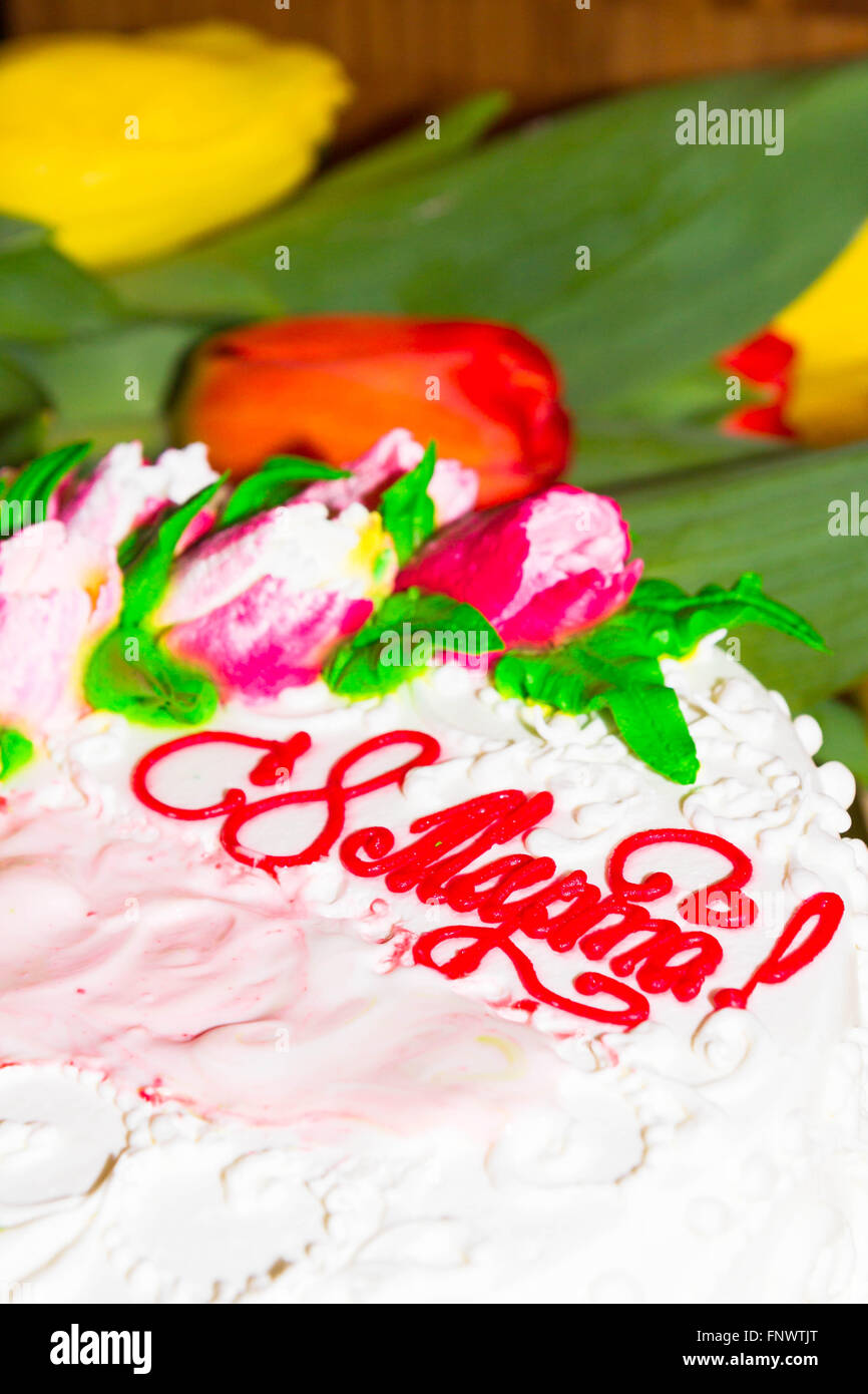 Beautiful cake for March 8 with tulips Stock Photo - Alamy
