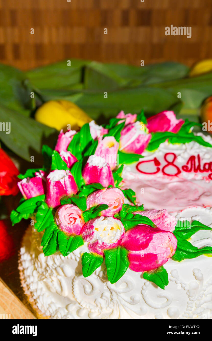 Beautiful cake for March 8 with tulips Stock Photo - Alamy