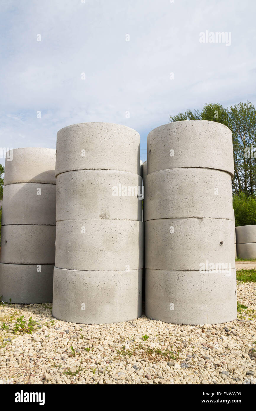 Rings for the construction of a well at the base of the building Stock ...