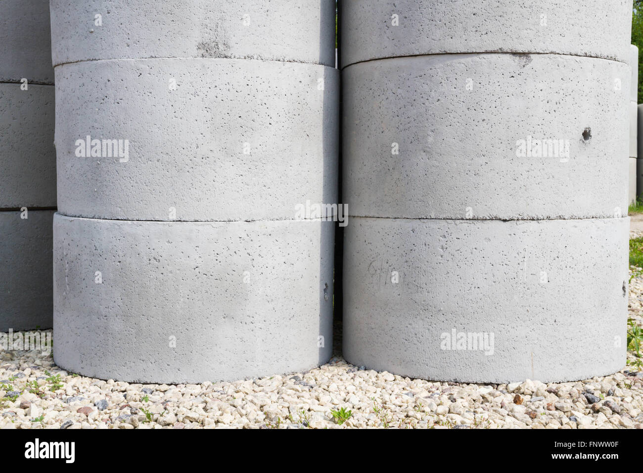 Rings for the construction of a well at the base of the building Stock ...