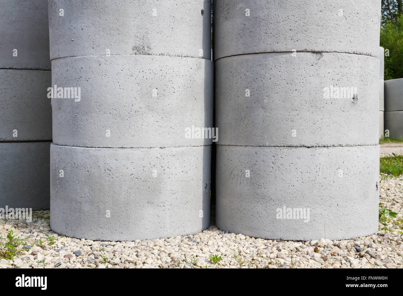 Rings for the construction of a well at the base of the building Stock ...