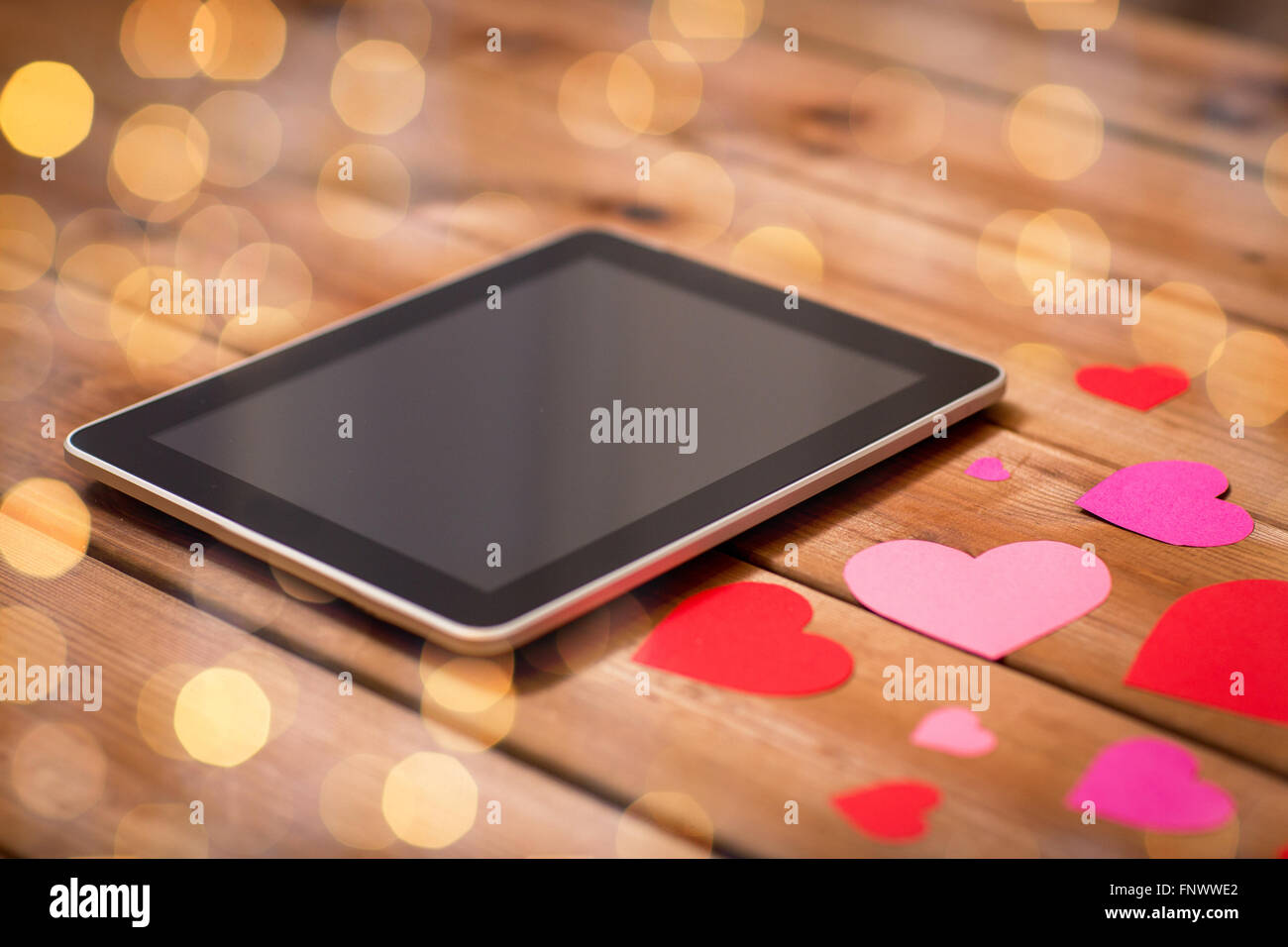 Tablet with pink heart hi-res stock photography and images - Alamy