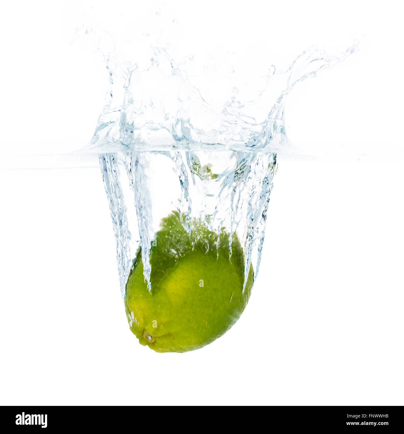 lime falling or dipping in water with splash Stock Photo - Alamy