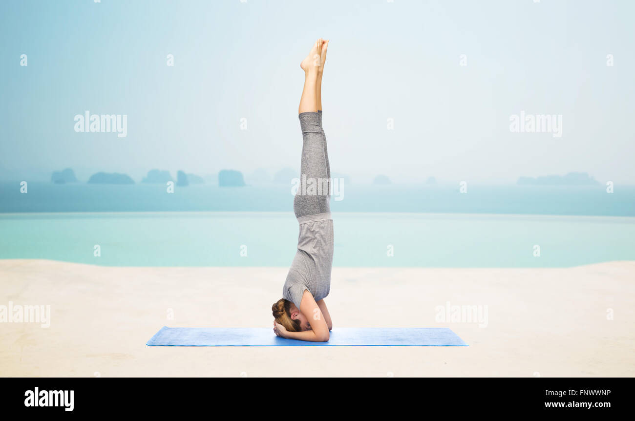 Headstand position hi-res stock photography and images - Alamy