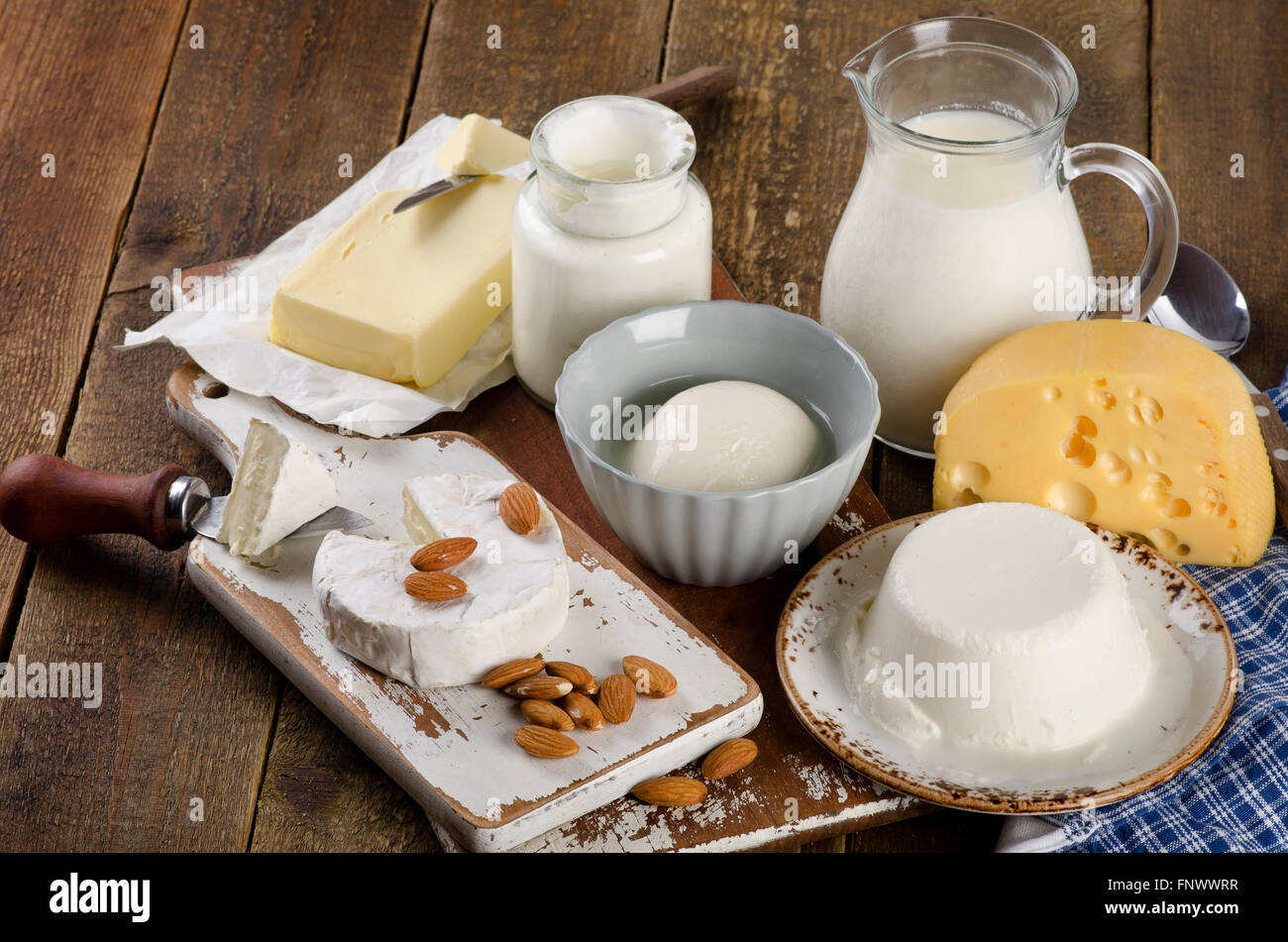 Dairy products on wooden table Stock Photo - Alamy