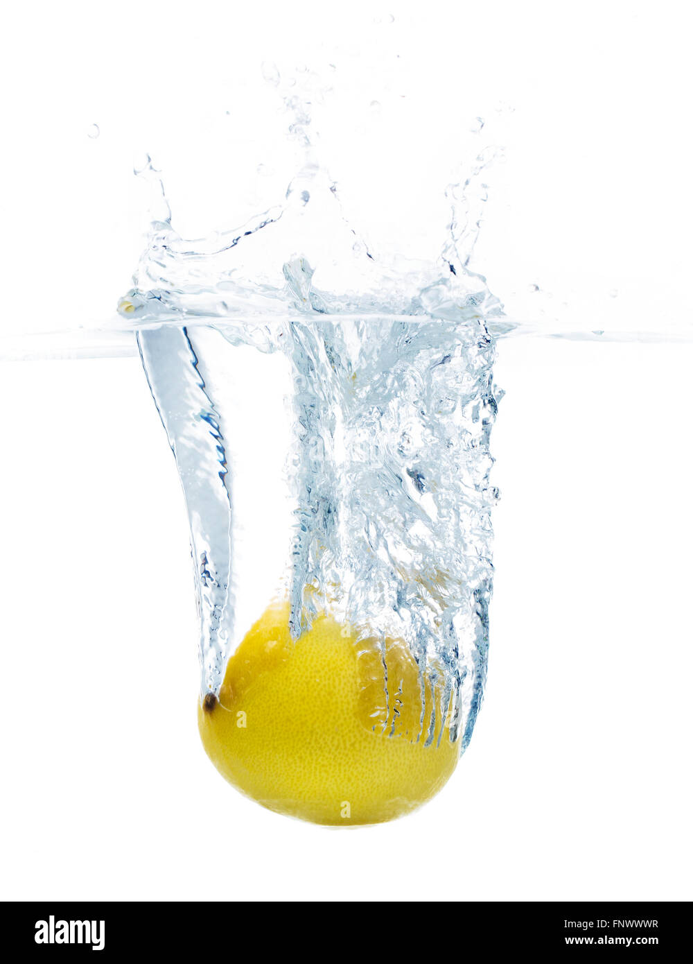 lemon falling or dipping in water with splash Stock Photo - Alamy