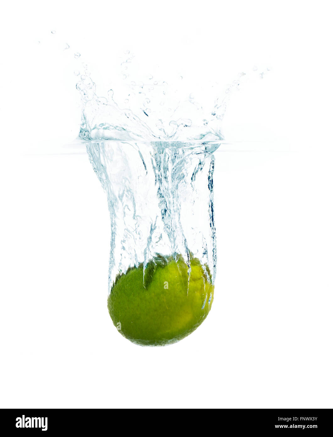 lime falling or dipping in water with splash Stock Photo - Alamy
