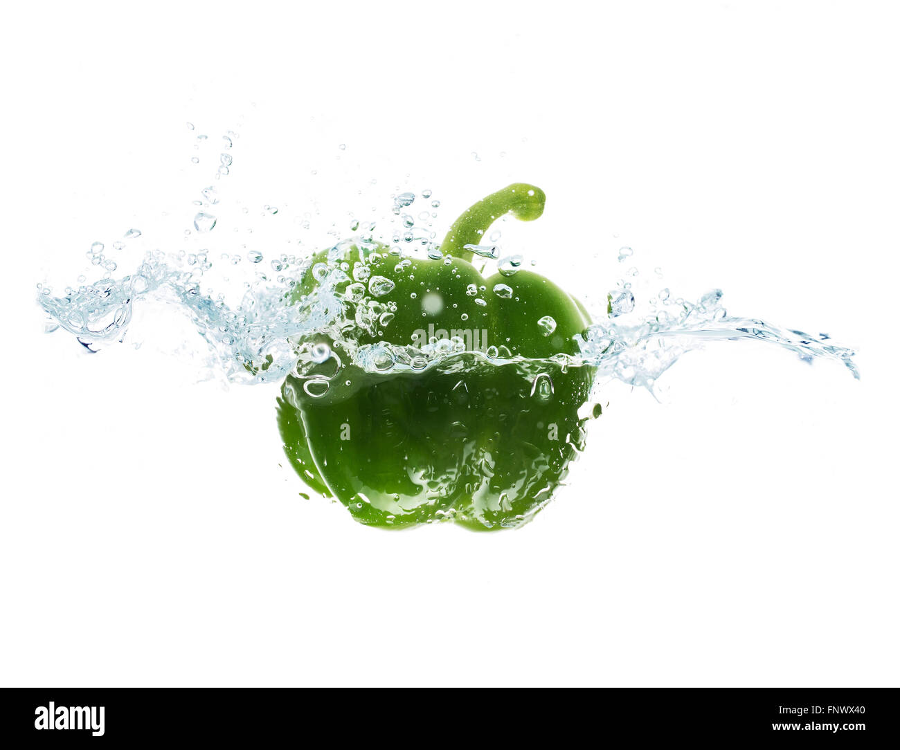 pepper falling or dipping in water with splash Stock Photo - Alamy