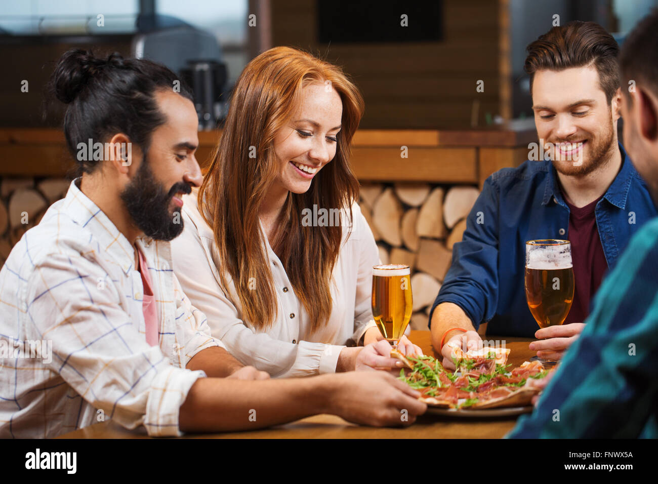 Sharing pizza hi-res stock photography and images - Alamy