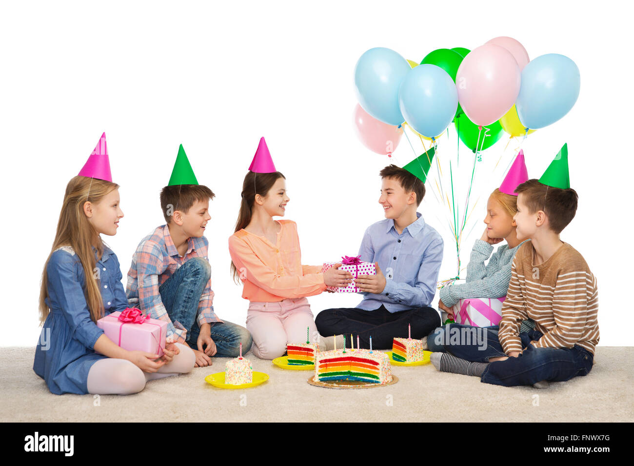 happy children giving presents at birthday party Stock Photo - Alamy