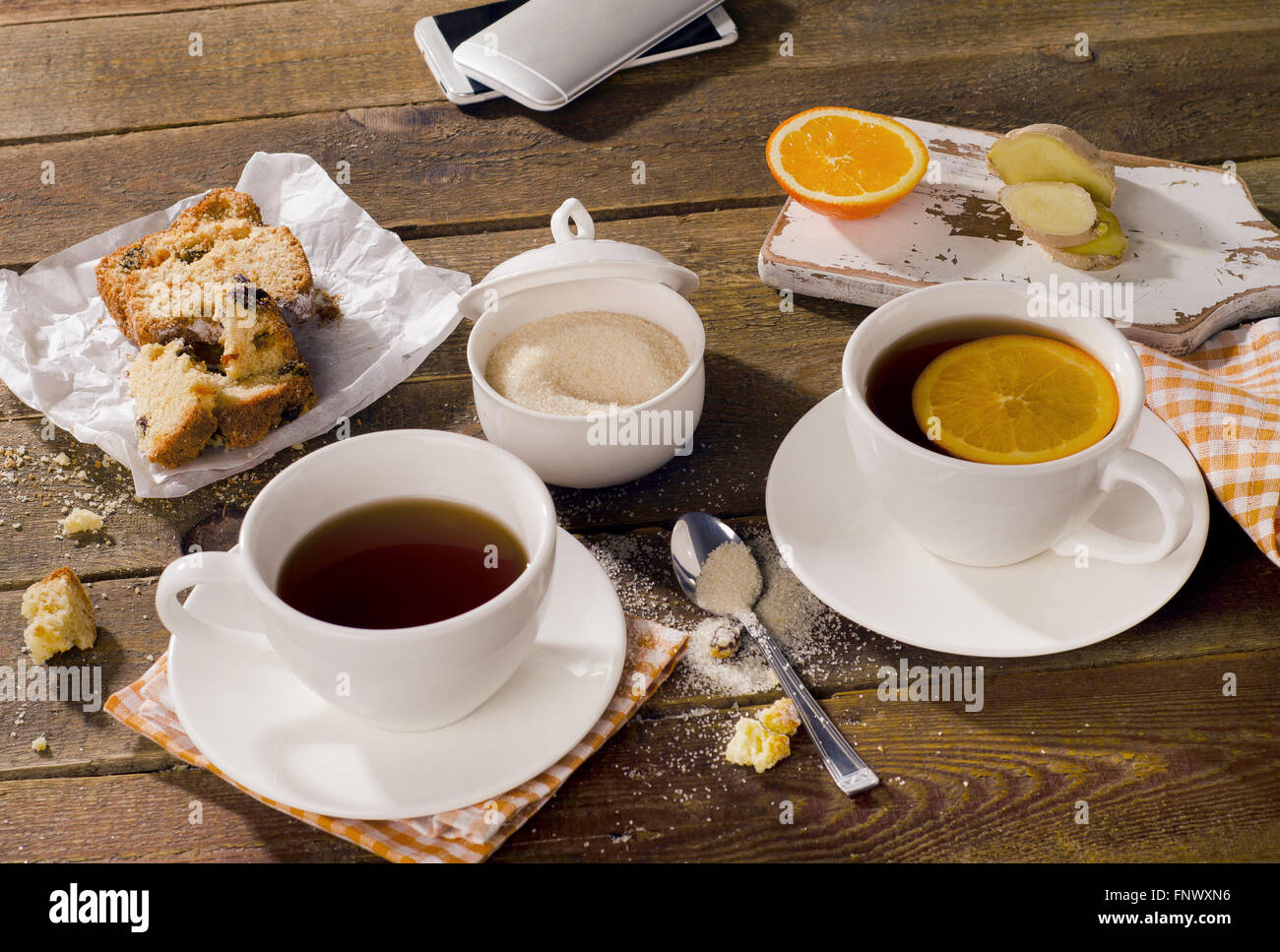 Two Cups of hot tea with sweet cake. View from above Stock Photo - Alamy