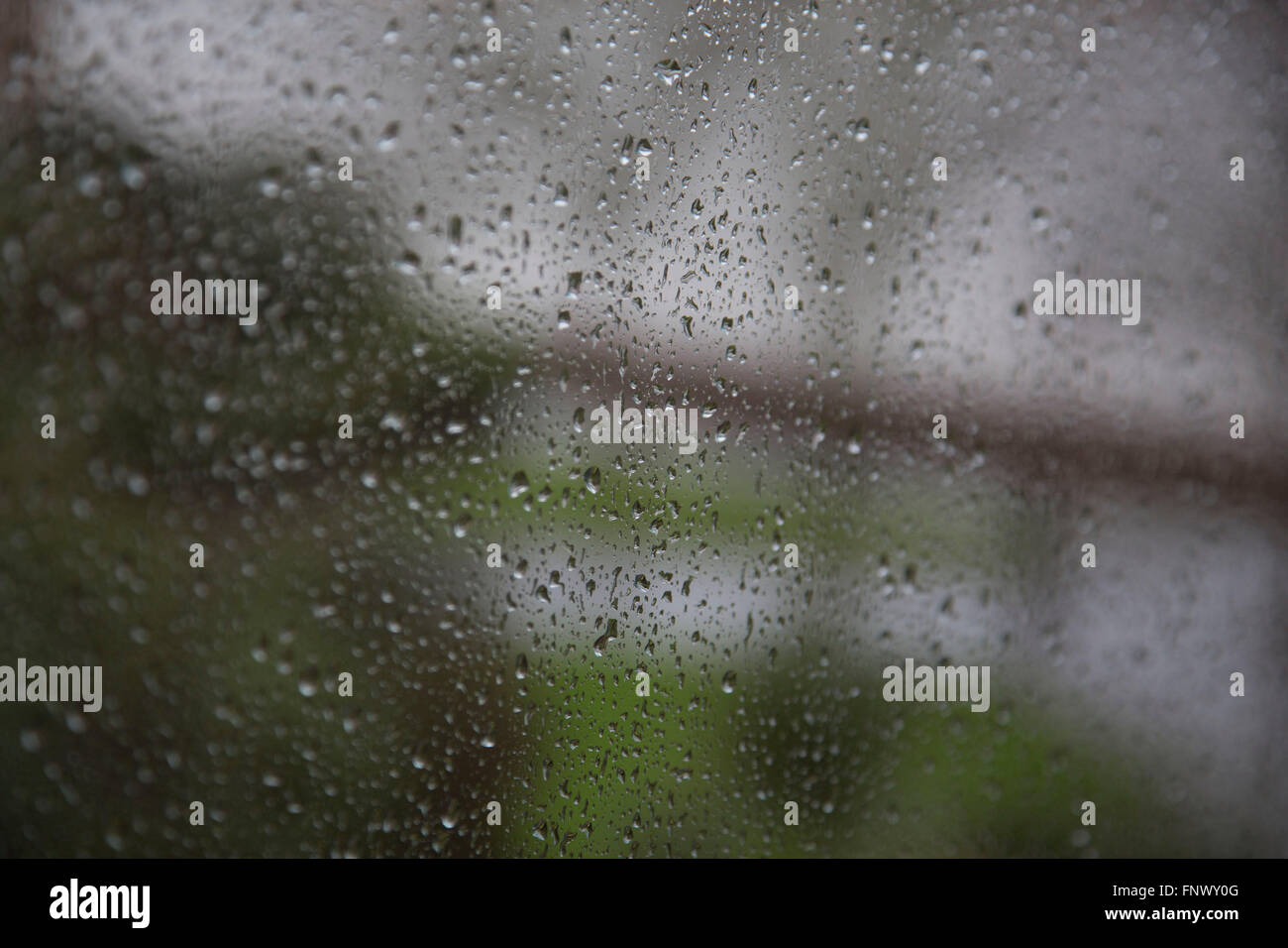 Raindrops on a window pane. London, England, UK Stock Photo - Alamy