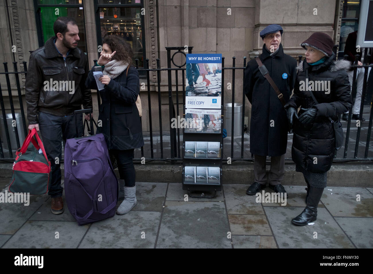 The Watchtower being handed out in the City of London, UK. The ...