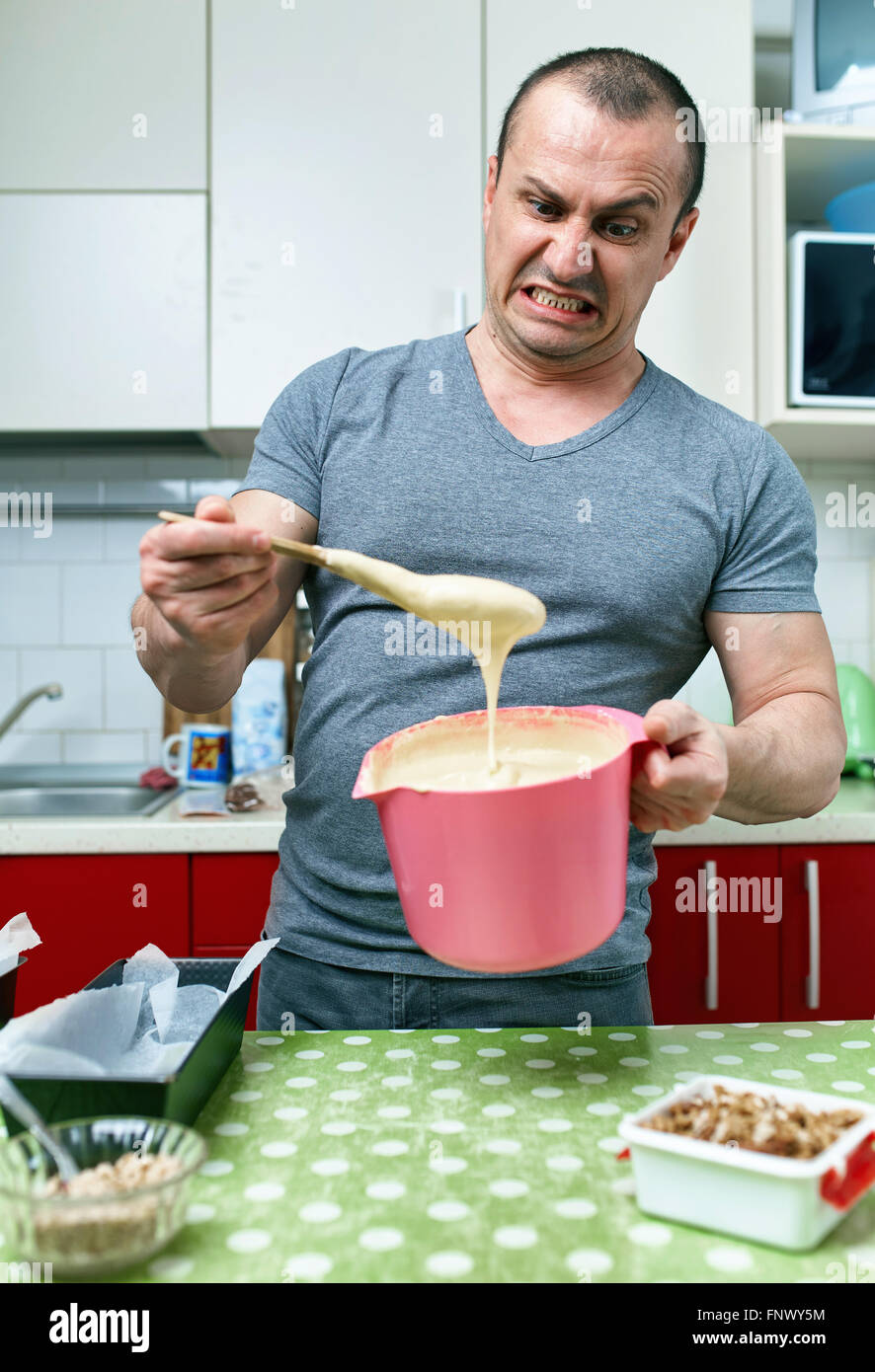 Angry cook having spoiled a dessert recipe Stock Photo - Alamy
