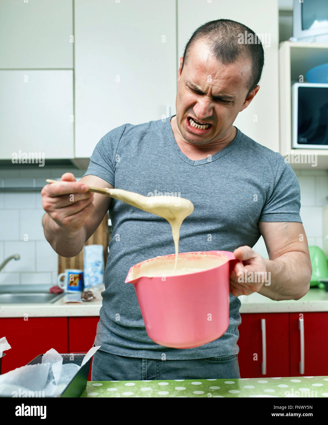 Angry cook having spoiled a dessert recipe Stock Photo - Alamy