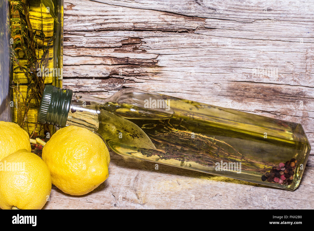 lemon and olive oil bottle Stock Photo - Alamy