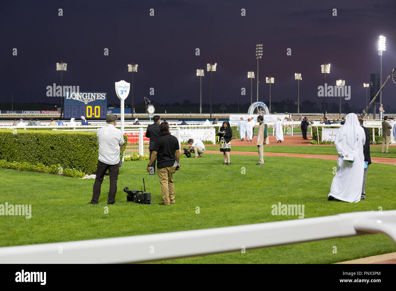 Officials waiting in the paddock area at the Meydan racecouse Dubai ...