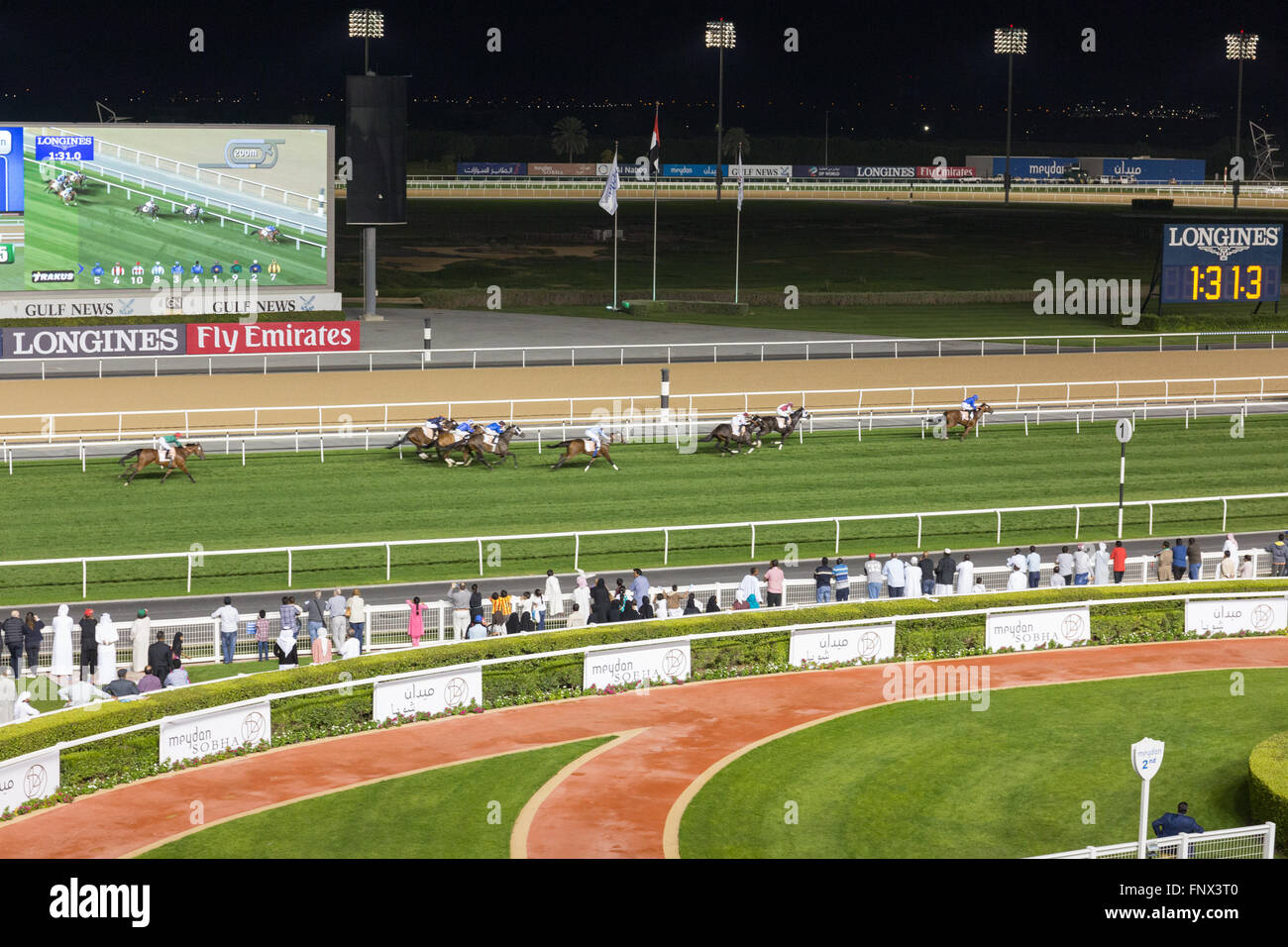 The Meydan race track at night Stock Photo - Alamy