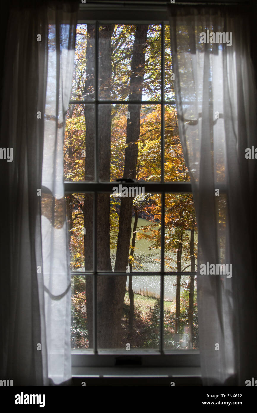 Countryside view of autumn through a window Stock Photo - Alamy