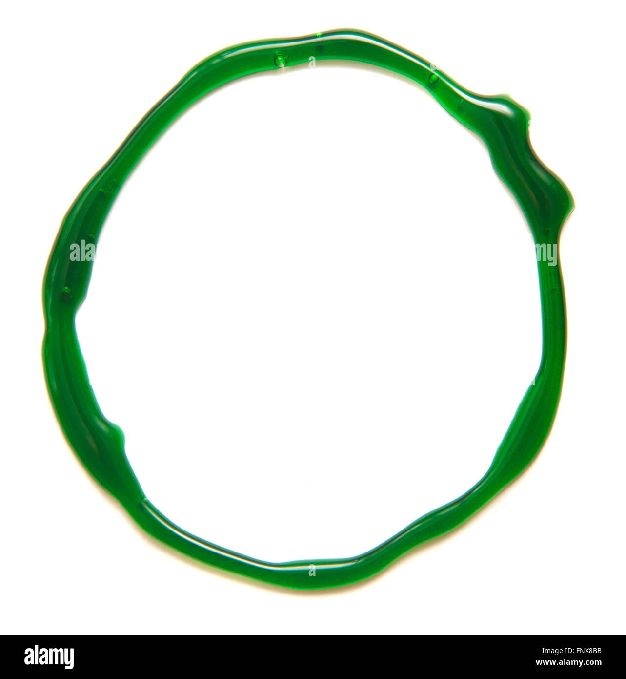 Circle of green paint on a white background Stock Photo - Alamy