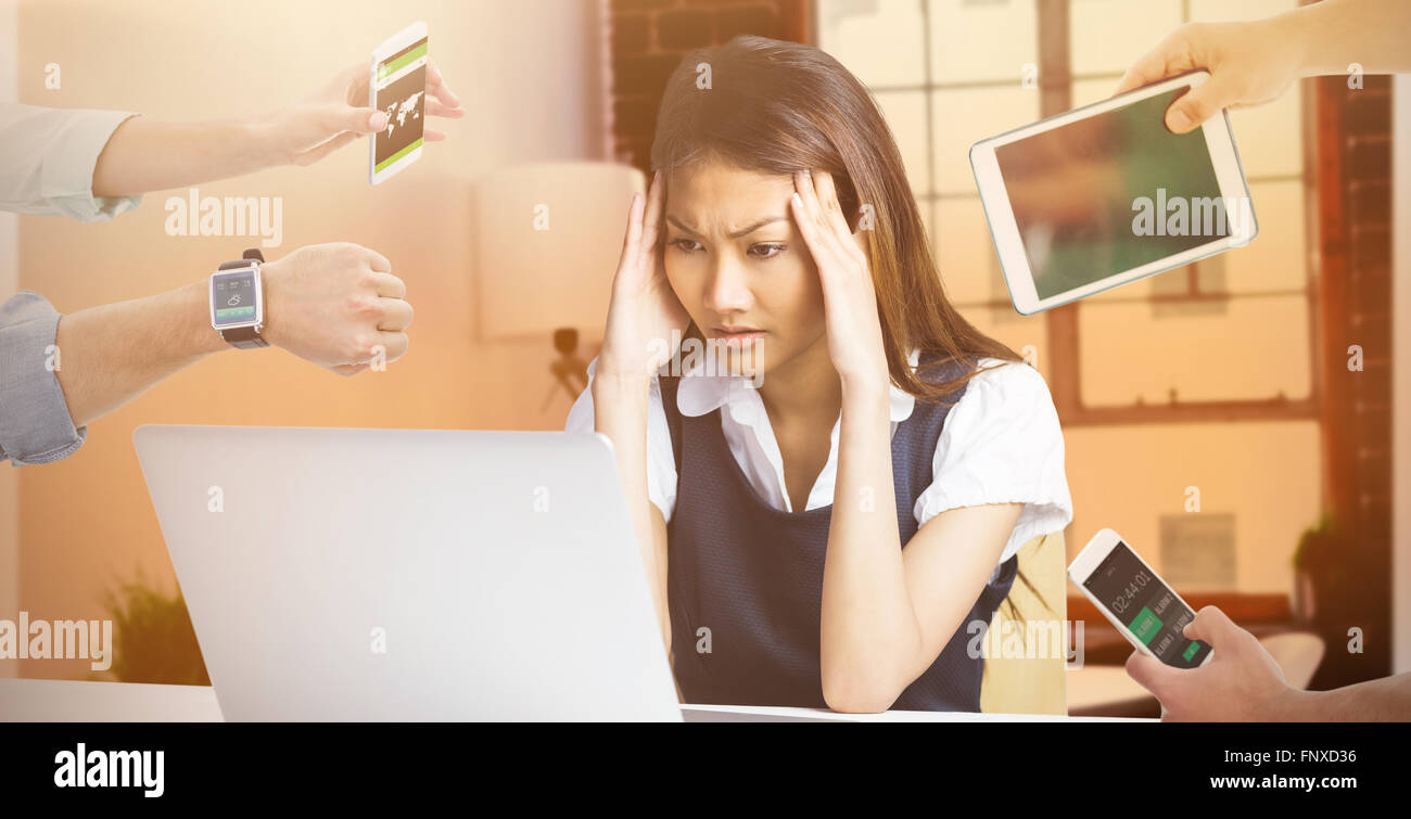 Composite image of hands holding devices Stock Photo - Alamy