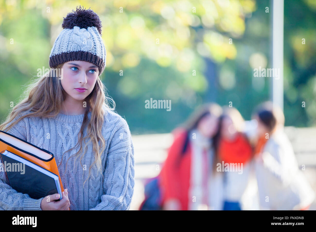 bully teen peer pressure bullies bullying new girl Stock Photo - Alamy